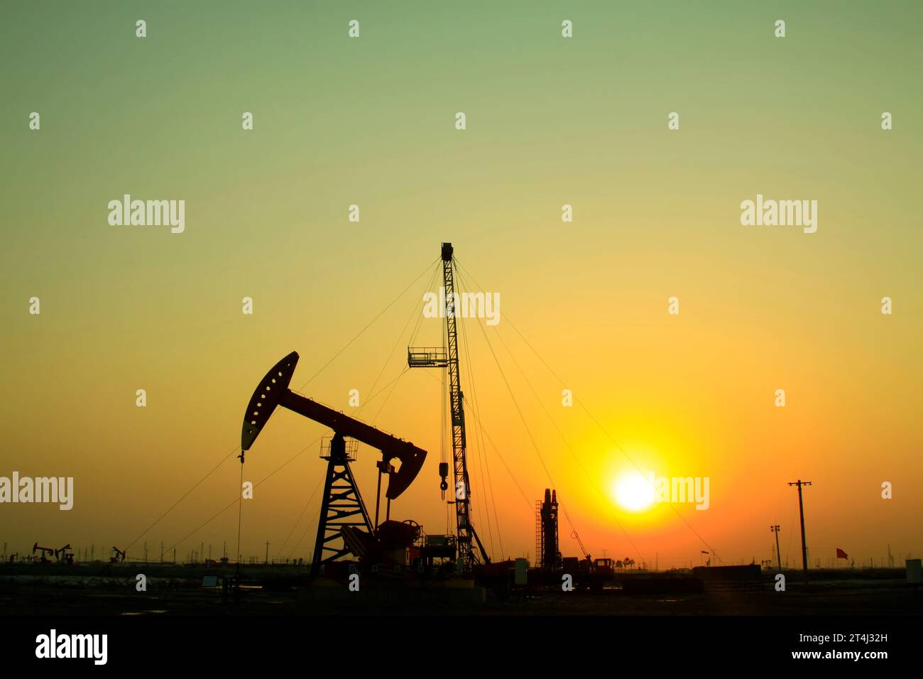 Crank balanced beam pumping unit in Jidong oilfield sunset scenery ...