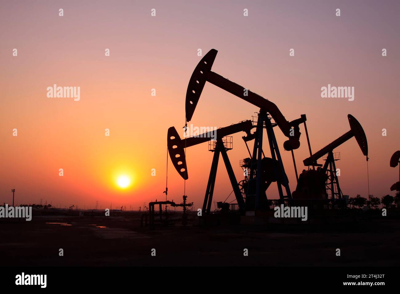 Crank balanced beam pumping unit in Jidong oilfield sunset scenery ...