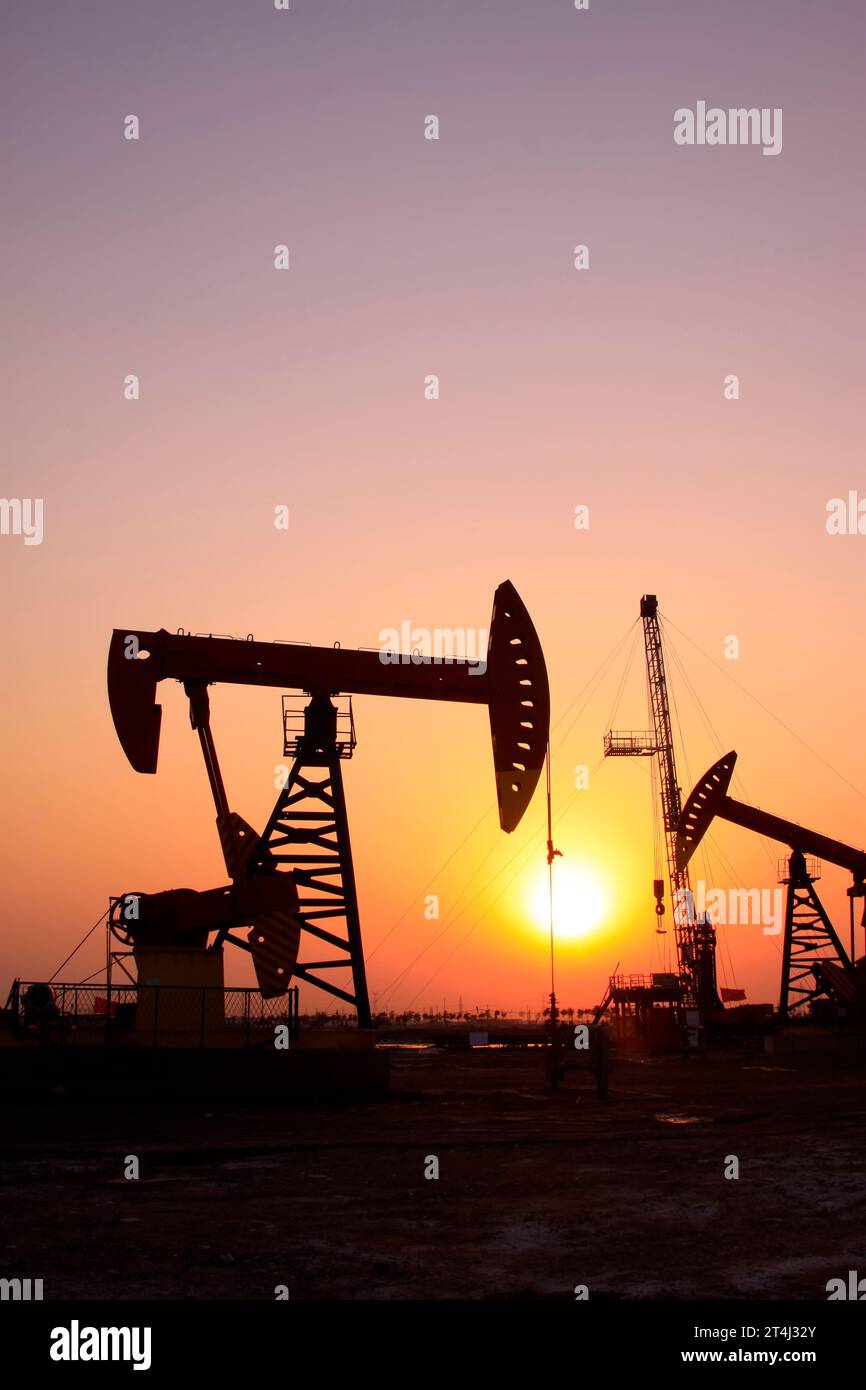 Crank balanced beam pumping unit in Jidong oilfield sunset scenery ...