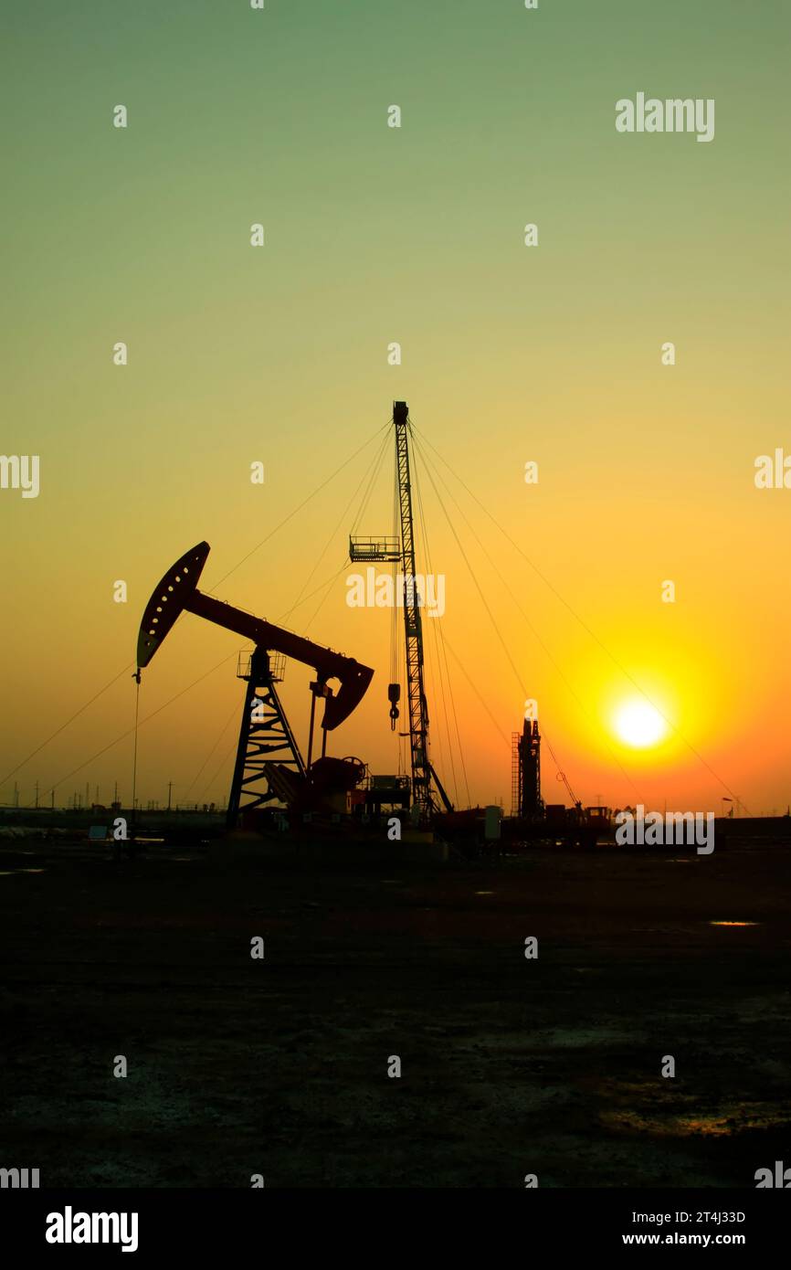 Crank balanced beam pumping unit in Jidong oilfield sunset scenery ...