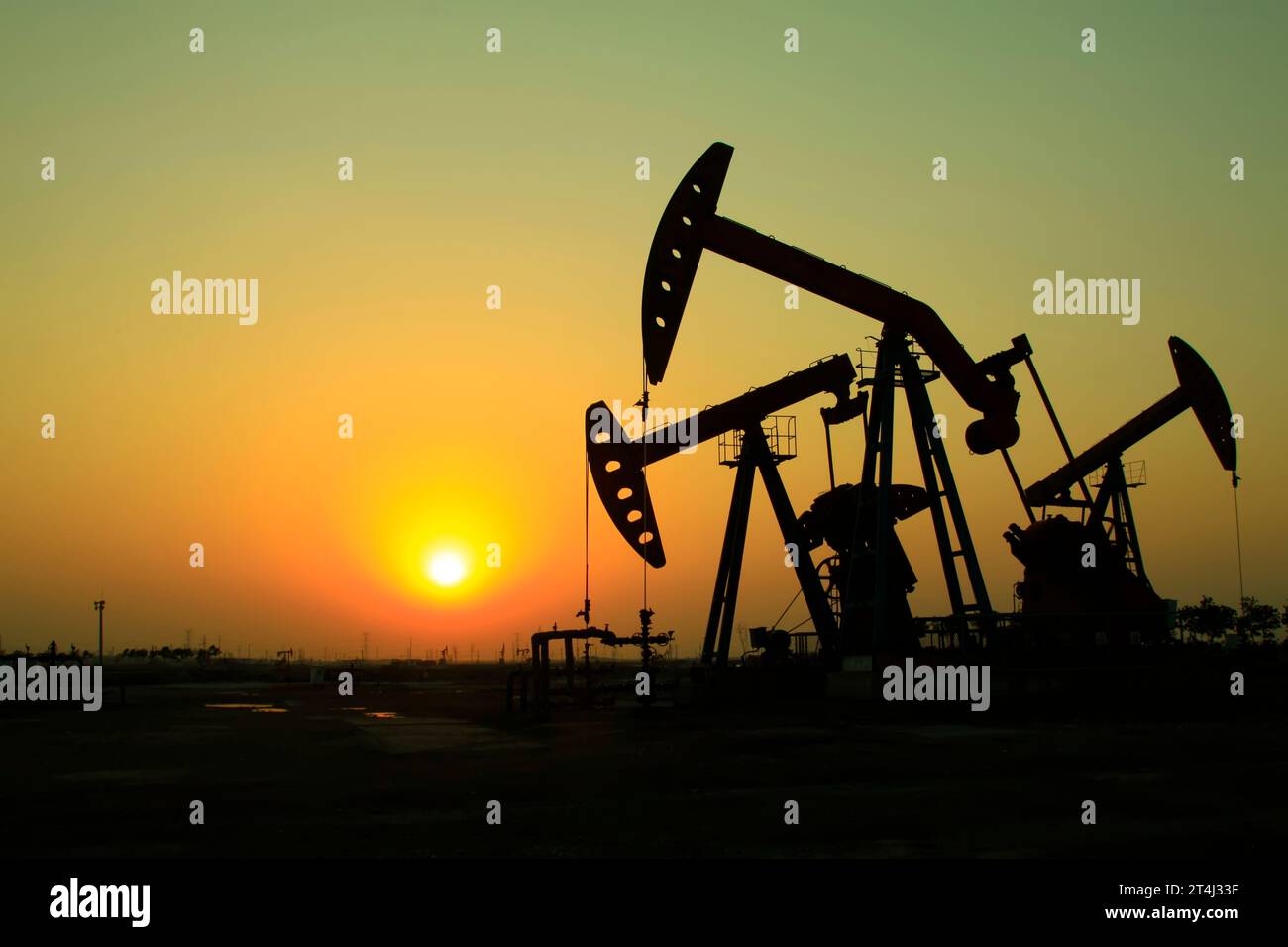 Crank balanced beam pumping unit in Jidong oilfield sunset scenery ...