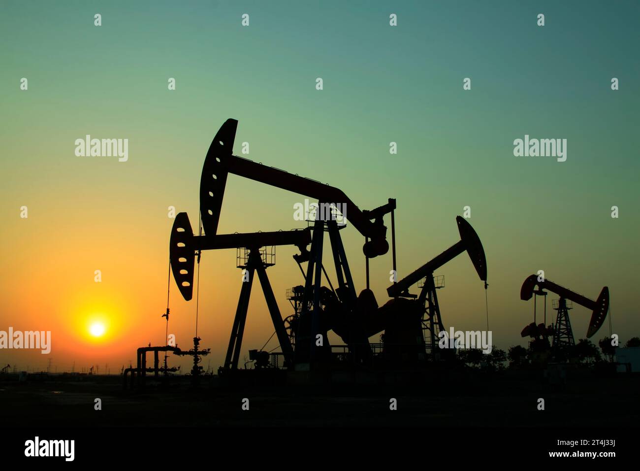 Crank balanced beam pumping unit in Jidong oilfield sunset scenery ...