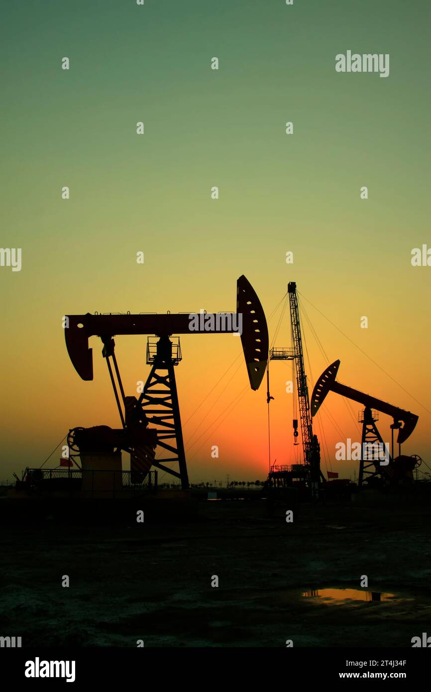 Crank balanced beam pumping unit in Jidong oilfield sunset scenery ...