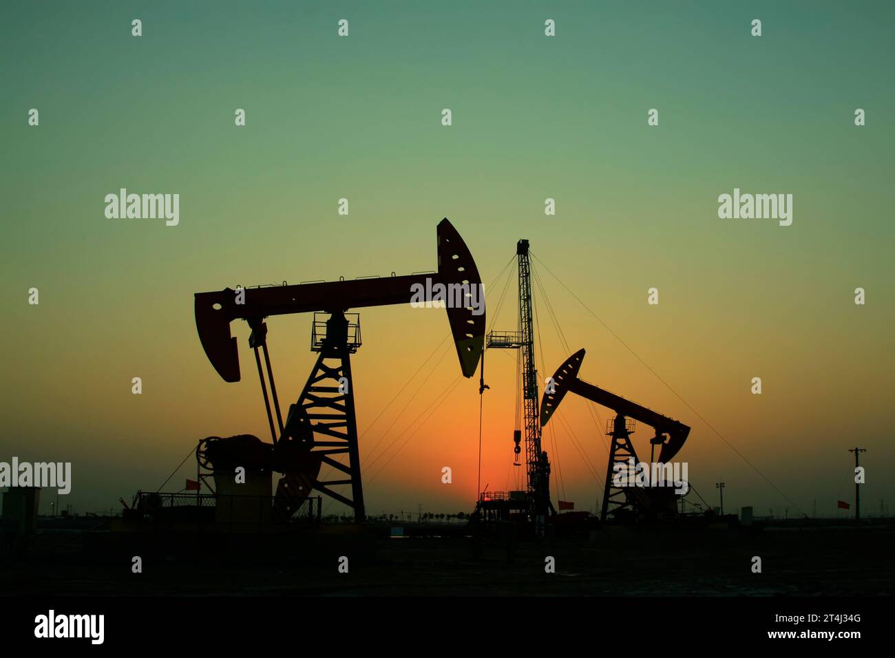 Crank balanced beam pumping unit in Jidong oilfield sunset scenery ...