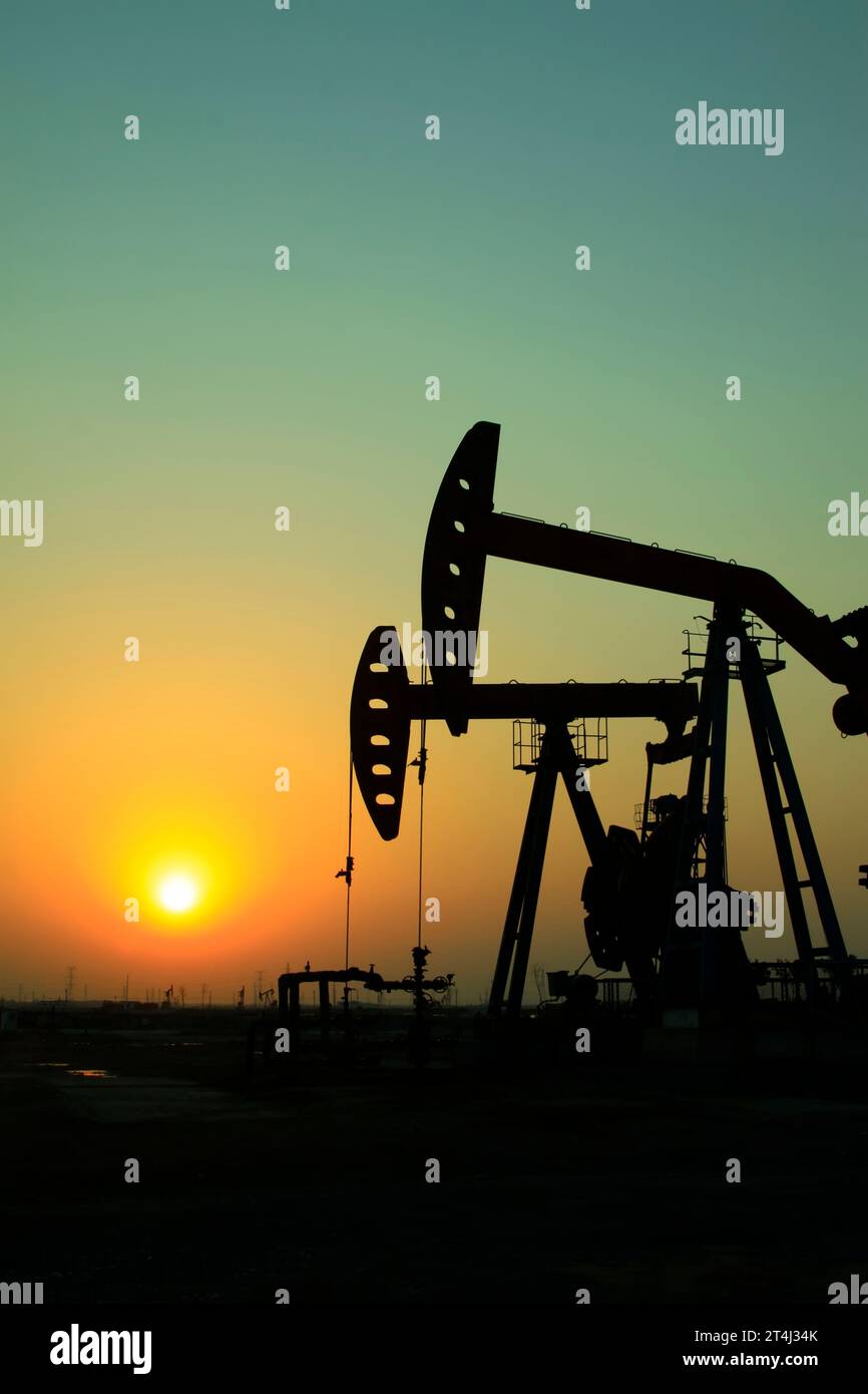 Crank balanced beam pumping unit in Jidong oilfield sunset scenery ...