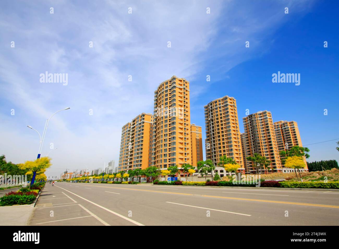 High-rise building under the blue sky, city scenery Stock Photo - Alamy