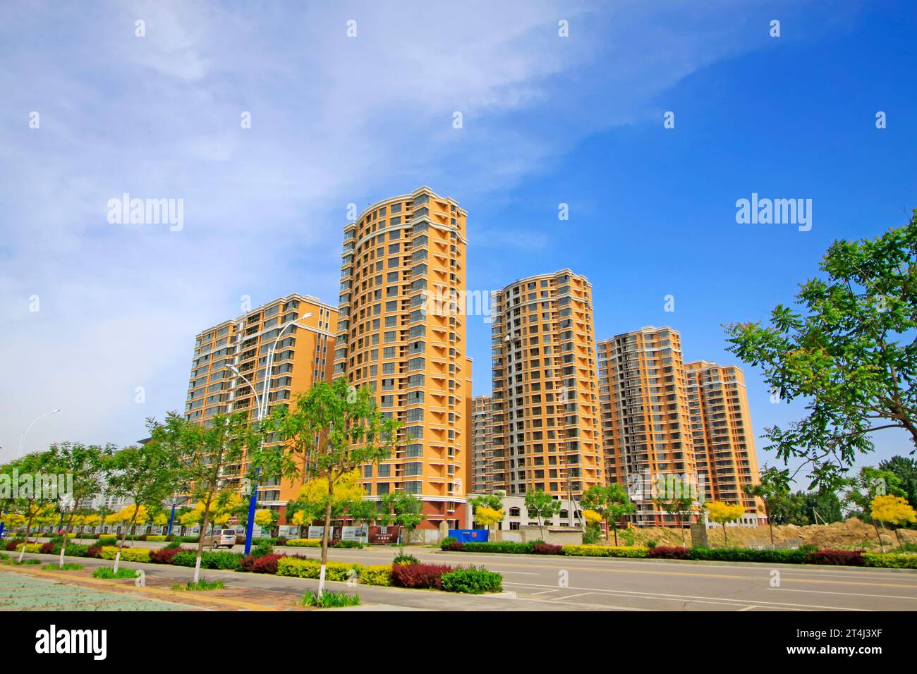 High-rise building under the blue sky, city scenery Stock Photo - Alamy