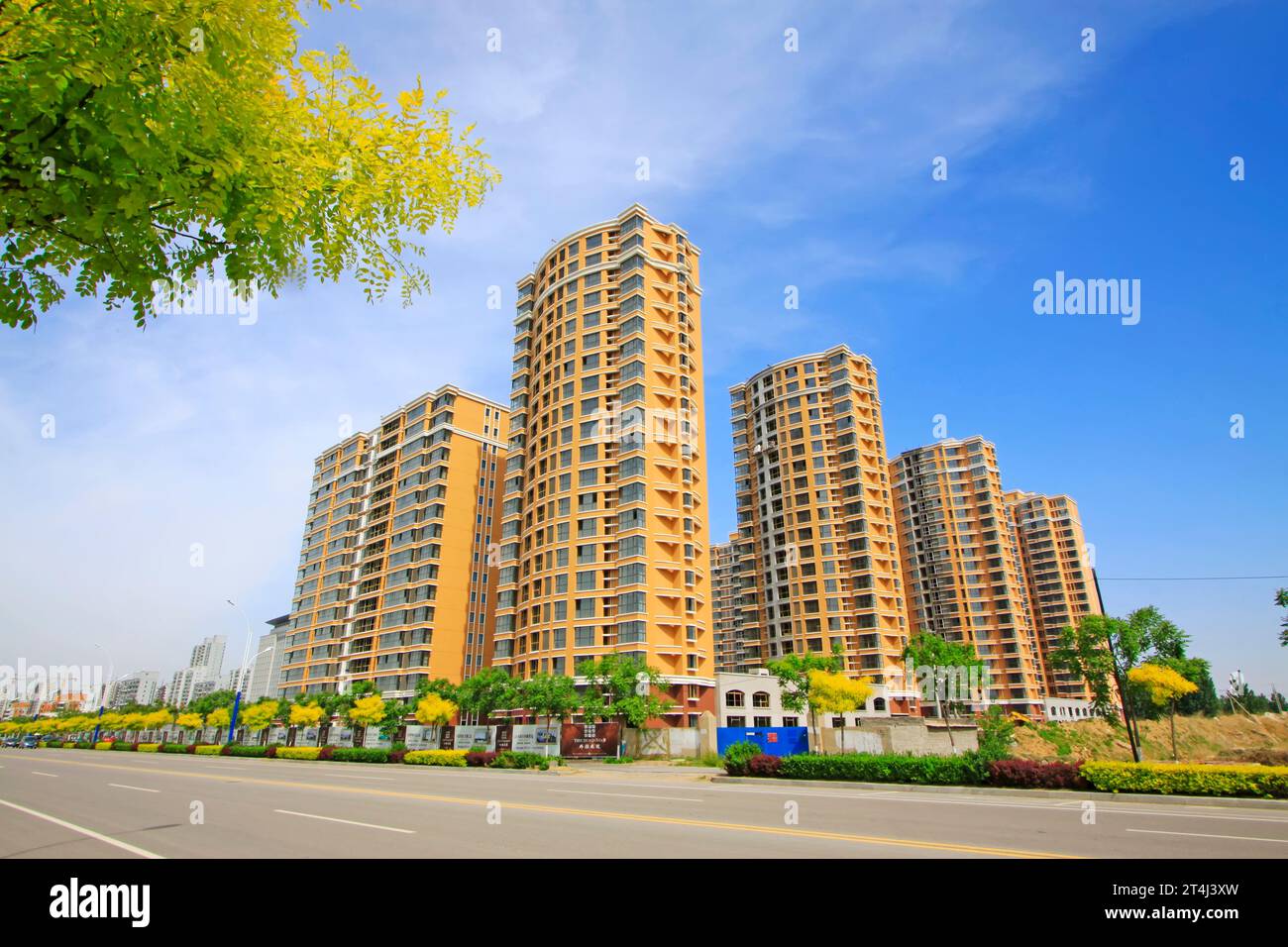 High-rise building under the blue sky, city scenery Stock Photo - Alamy