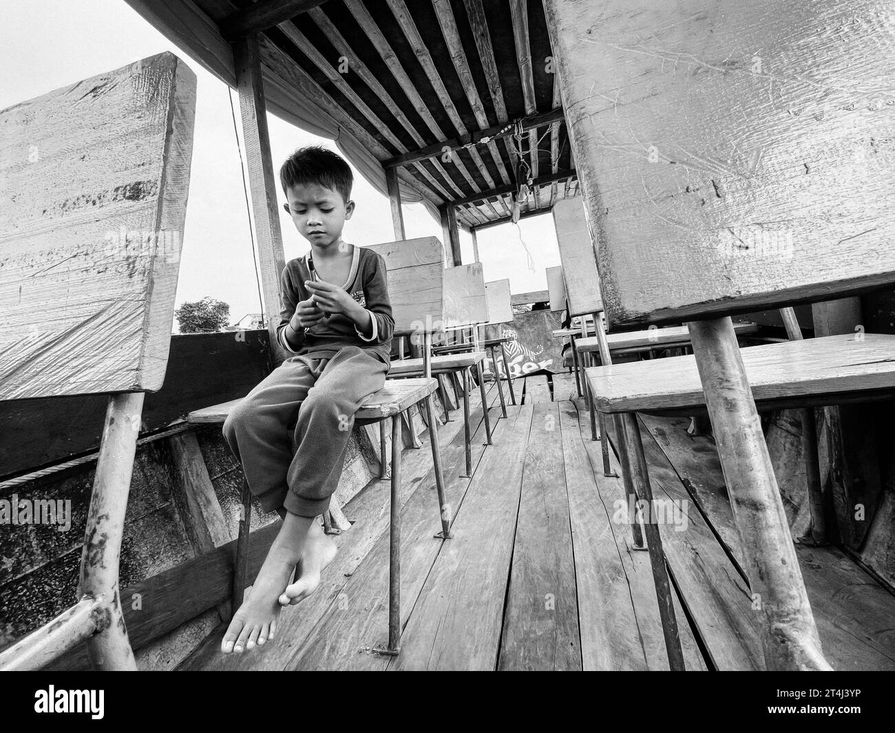 Cambodia, Kampong Phluk, local boy Stock Photo - Alamy