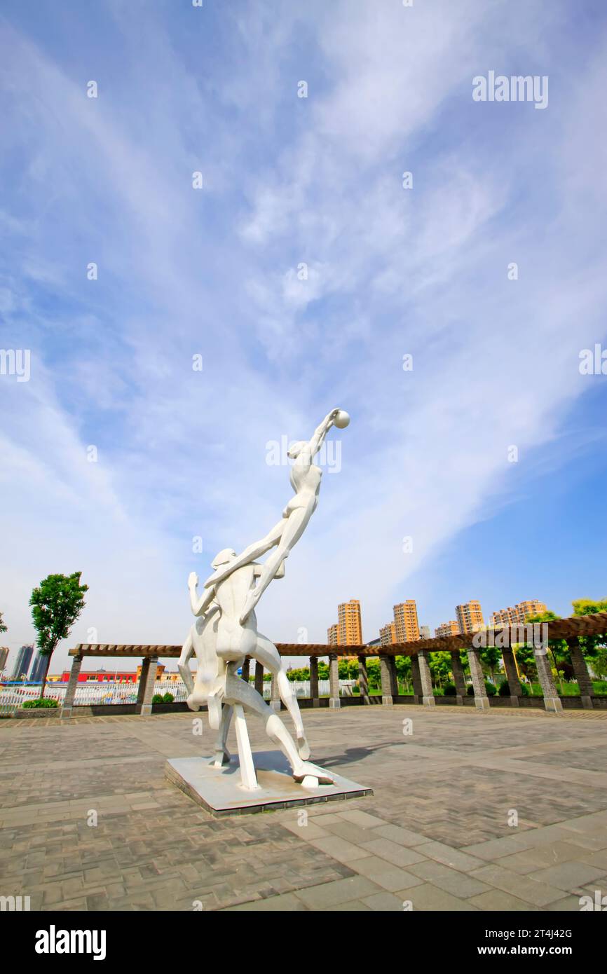 Volleyball players sculptures in the park, closeup of photo Stock Photo ...