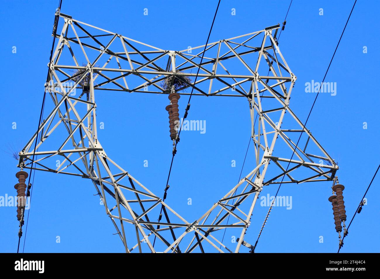 high voltage electric power steel tower, closeup of photo Stock Photo ...