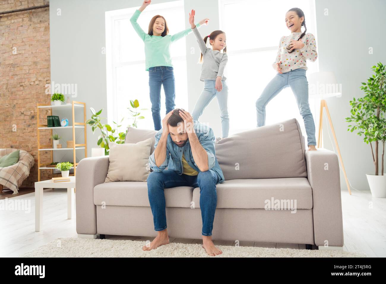 Full length body size photo of annoyed guy with headache suffering from ...