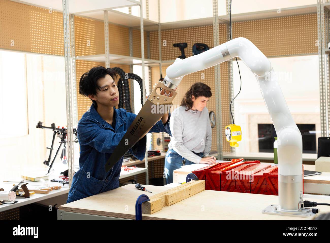 EDITORIAL USE ONLY Makers at work in a live workshop space in Somerset House, London, ahead of ...