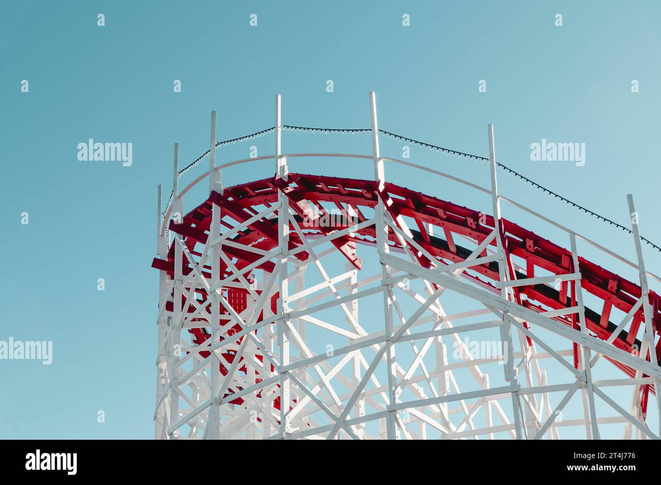 Giant Dipper ride against a blue sky at Santa Cruz Boardwalk Stock ...