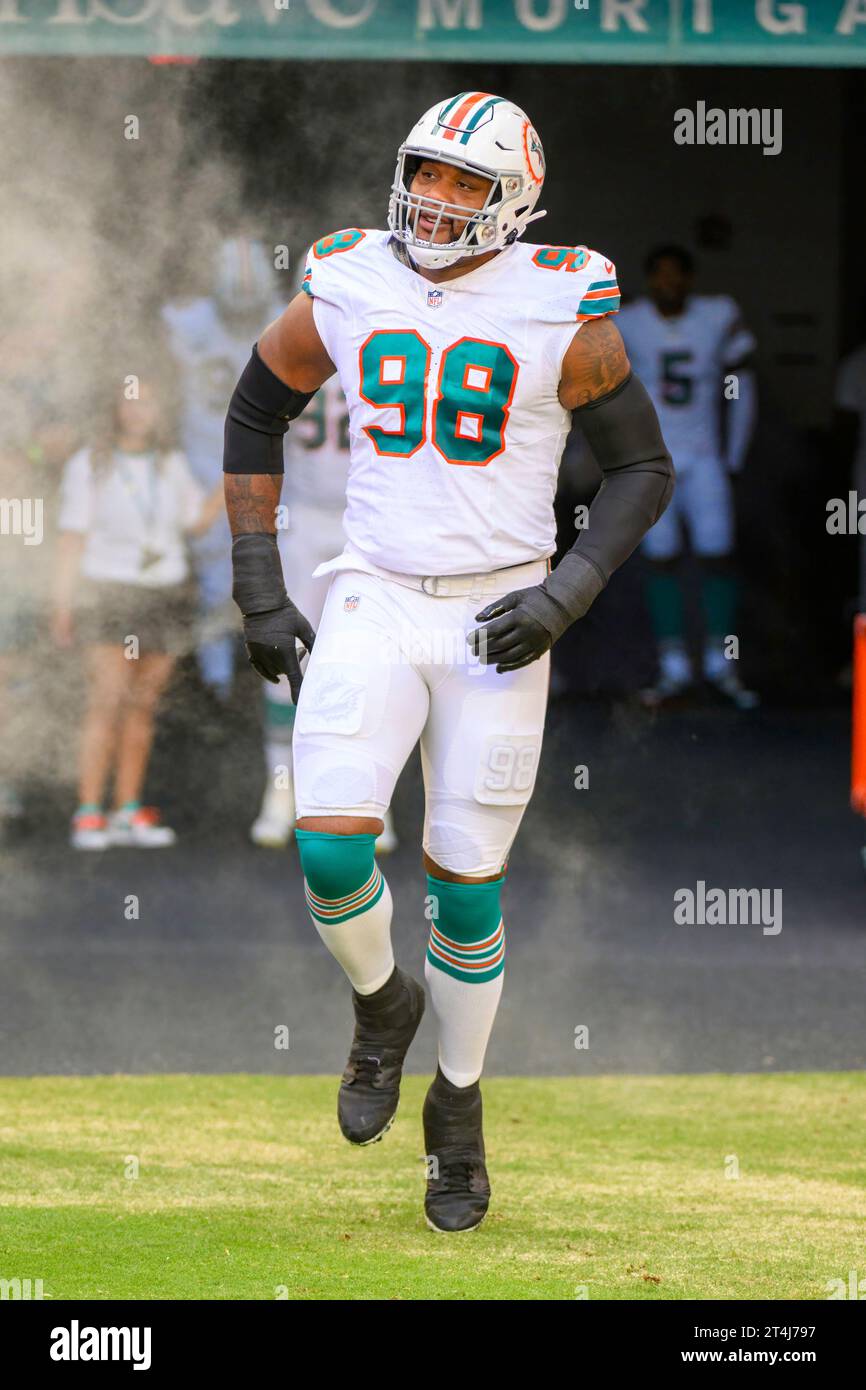 Miami Dolphins defensive tackle Raekwon Davis (98) runs onto the field ...
