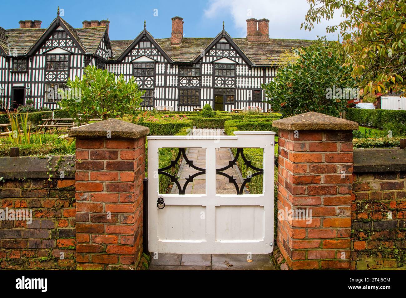The Old Hall hotel, a half timbered black and white former manor house ...