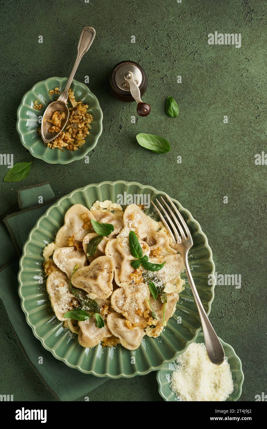 Homemade Italian ravioli pasta in heart shape with beef meat, cheese ...
