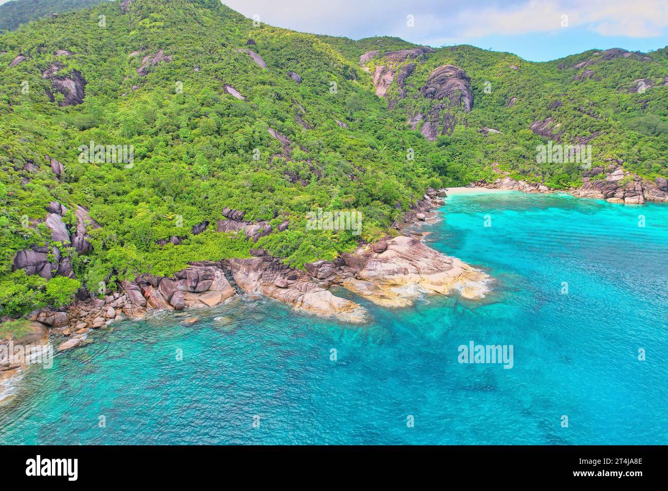 Drone shot of Anse du riz, rice beach beach, transparent sea, lush ...