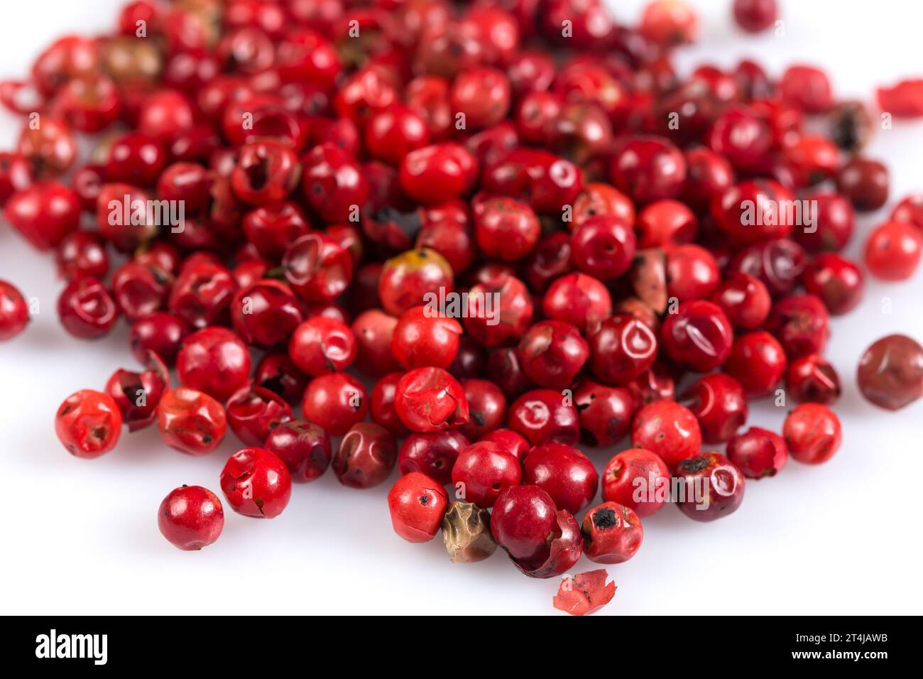 Pepper red peppercorns isolated on white background Stock Photo - Alamy