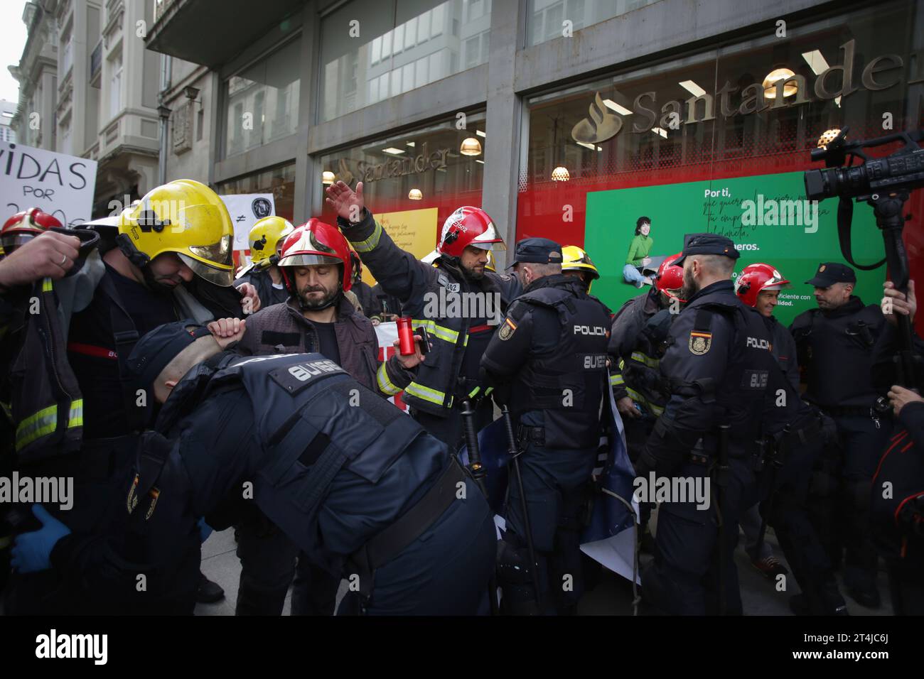 National police officers and firefighters gather during a protest in ...