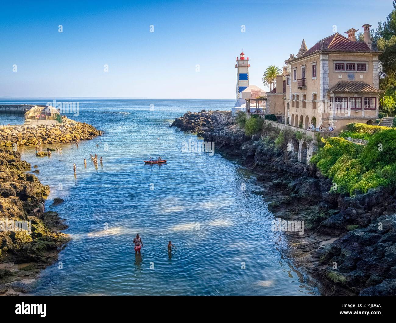 The Santa Marta Lighthouse on a small cove swimming area off the ...