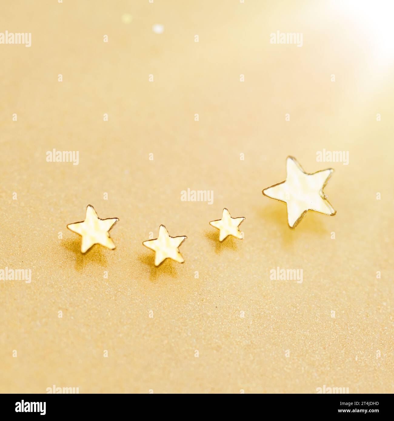 Christmas Golden Stars on Shiny Gold Background. Festive sparkling ...