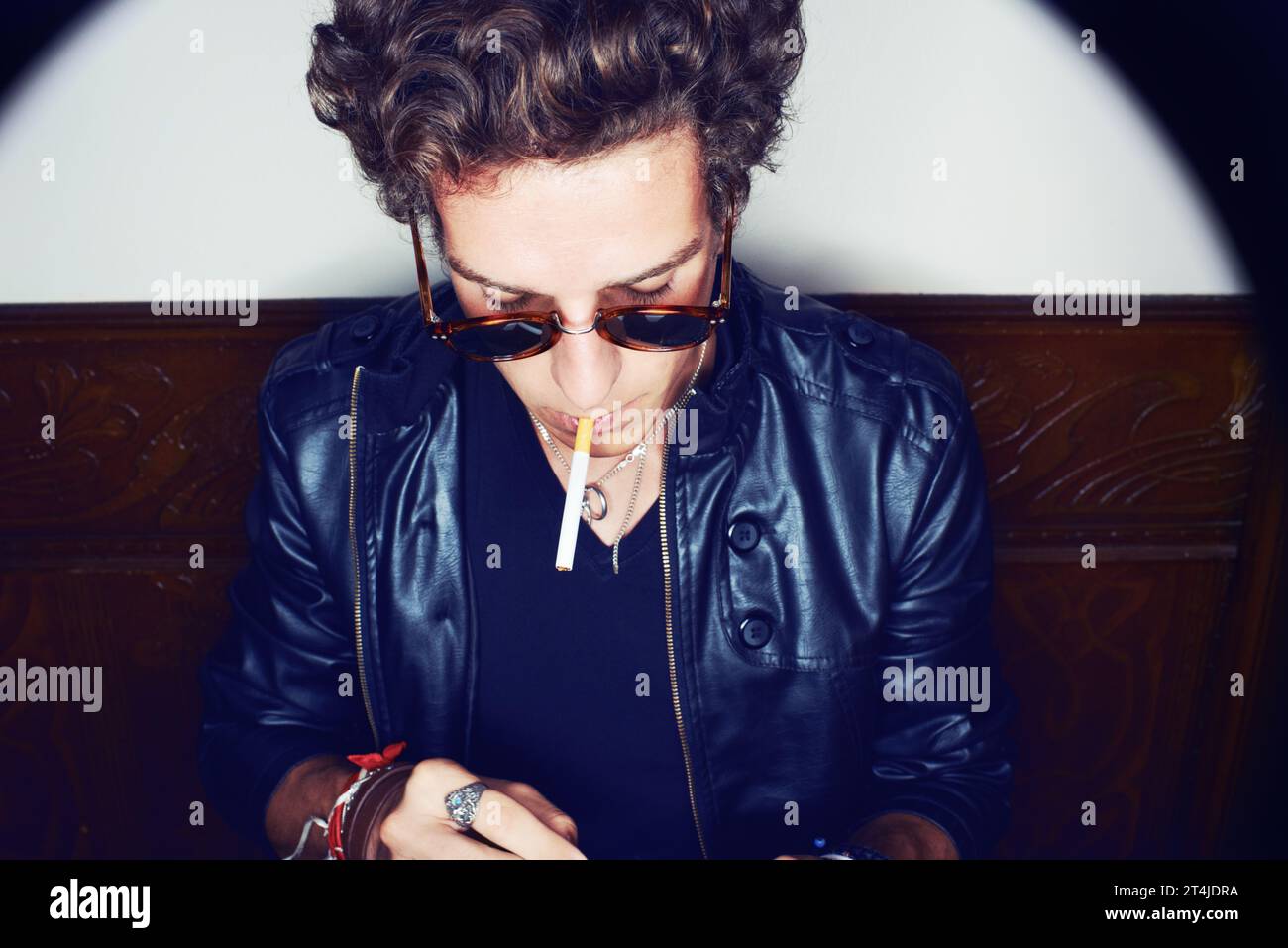 Man with cigarette, punk in sunglasses and rockstar attitude on white ...