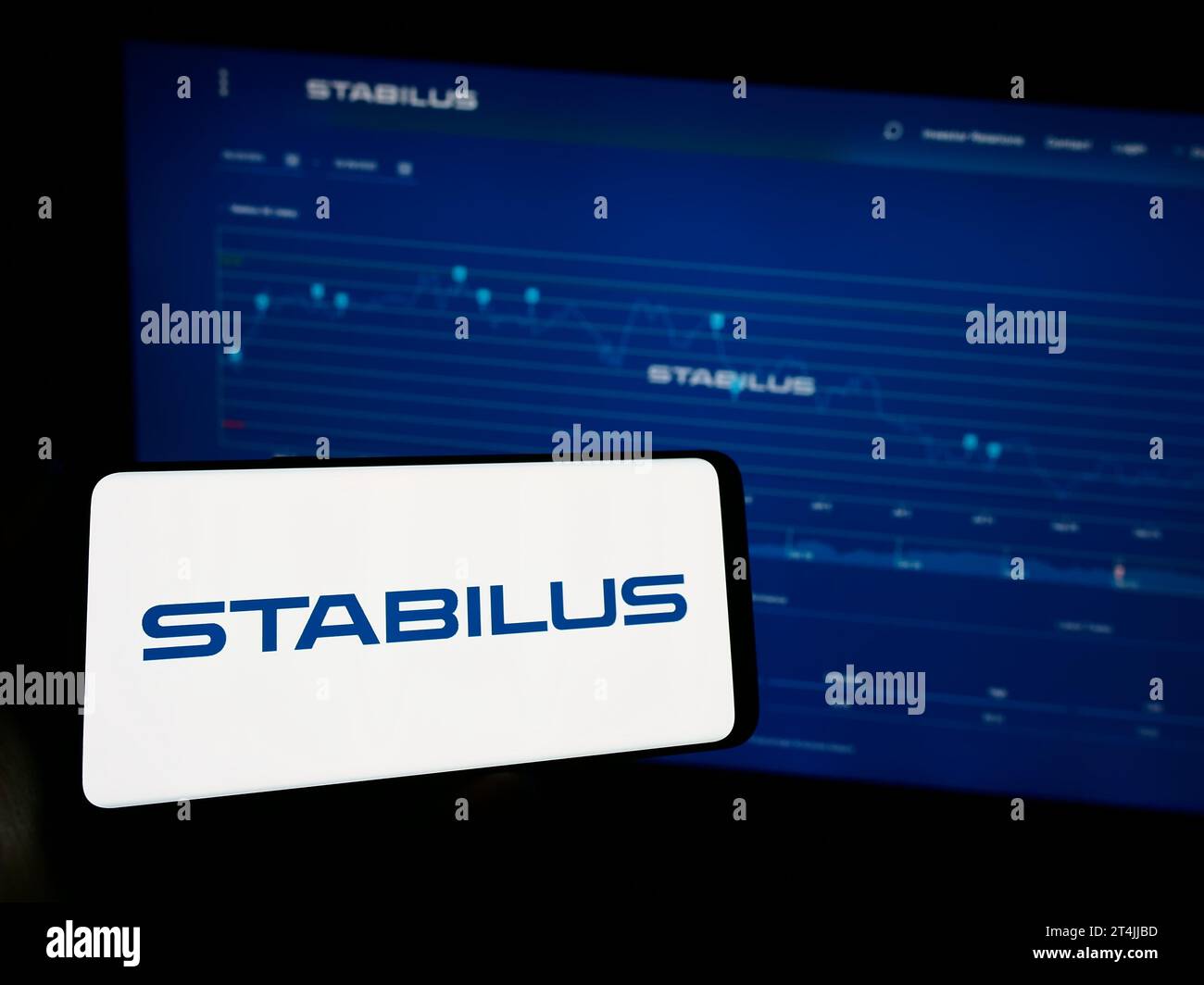 Person holding cellphone with logo of German motion control company ...