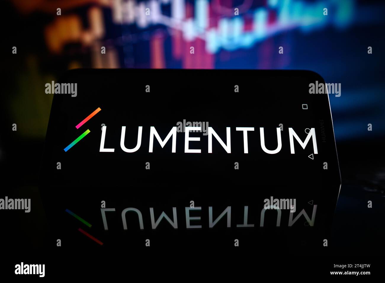 In this photo illustration a Lumentum logo is displayed on a smartphone ...