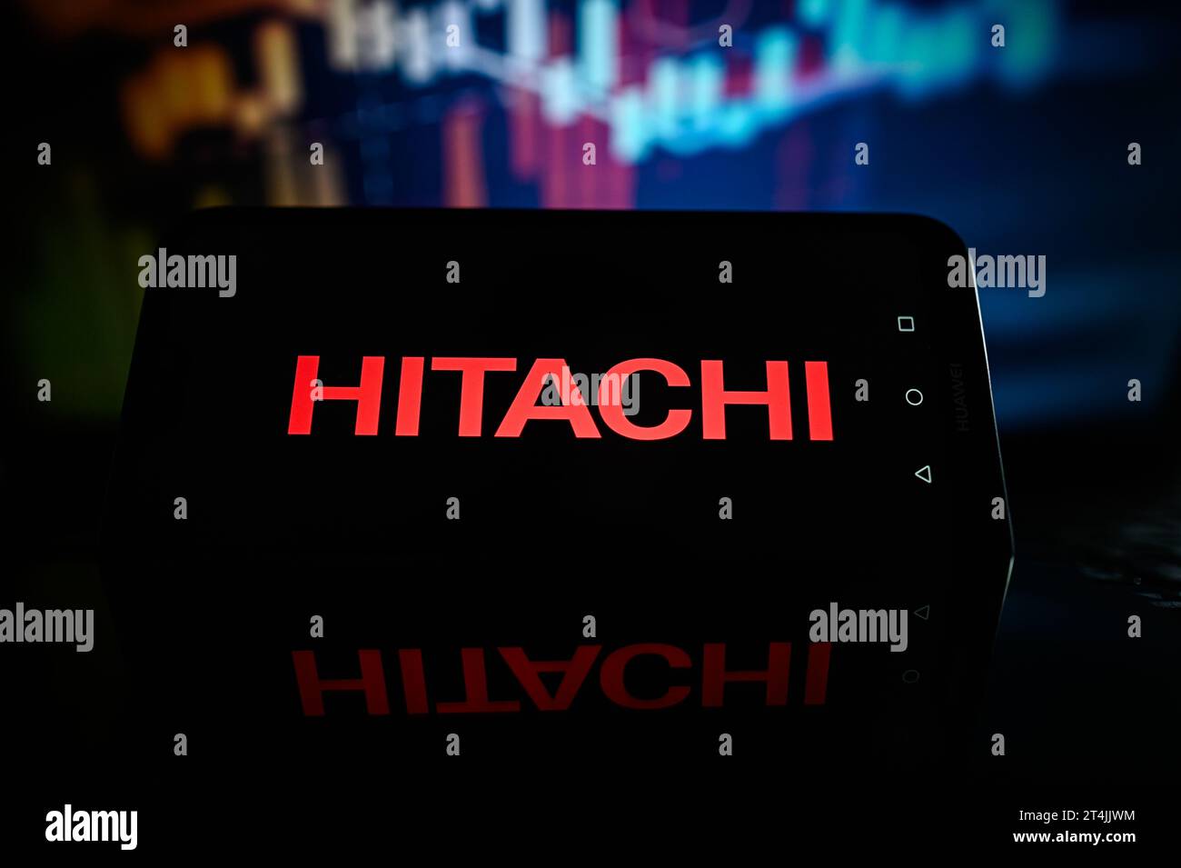 In this photo illustration an Hitachi logo is displayed on a smartphone ...