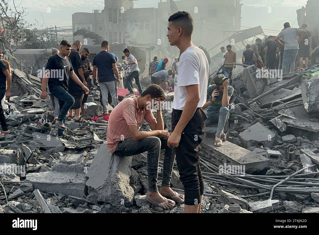 Palestinians look for survivors following Israeli airstrike in ...