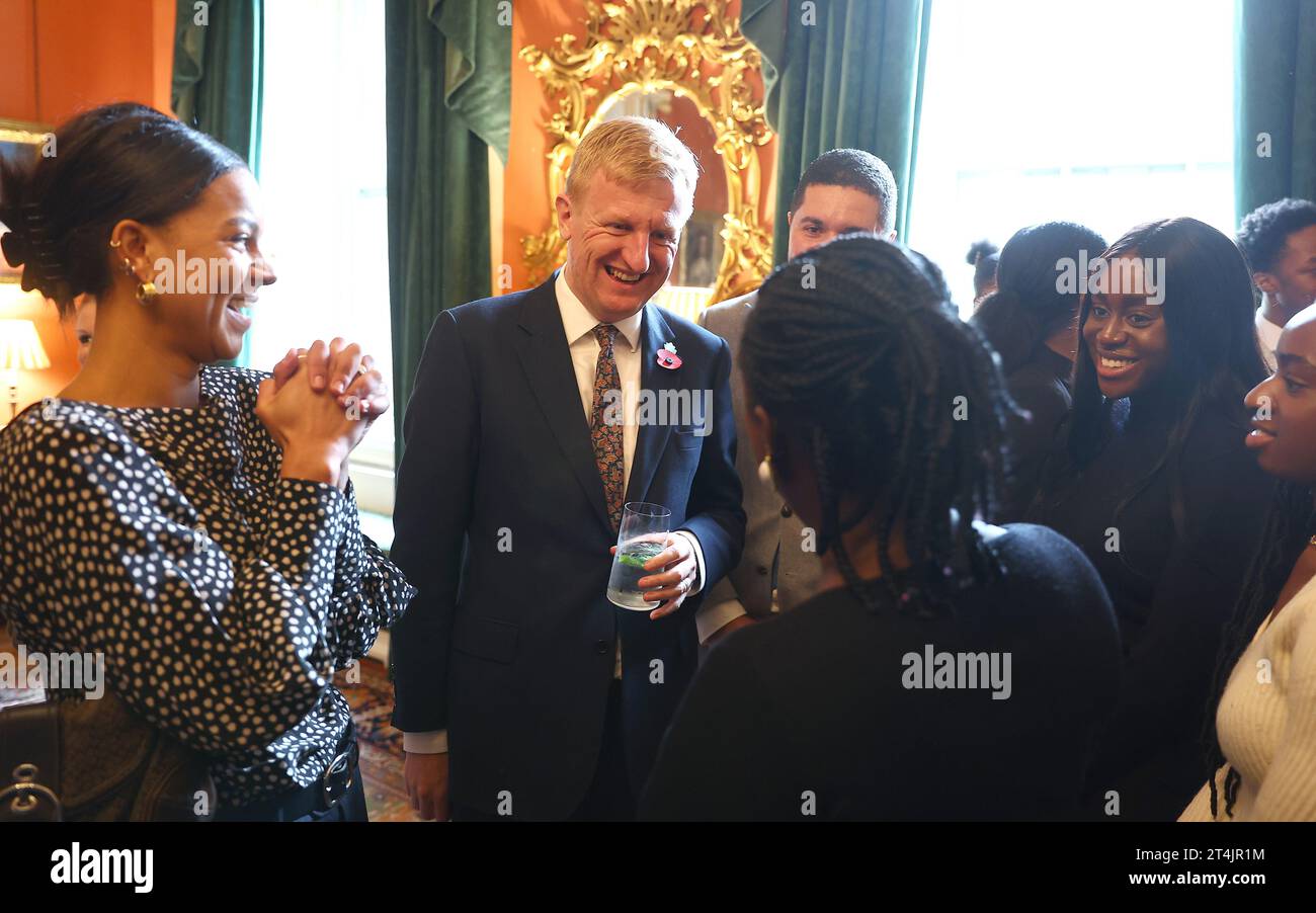 Deputy Prime Minister Oliver Dowden (centre) hosts a reception in ...