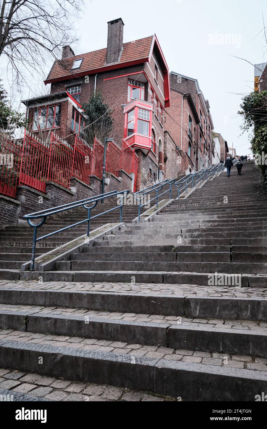 Two women walking up staircase hi-res stock photography and images - Alamy