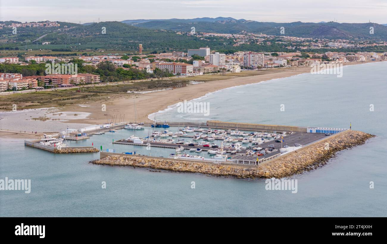 Aerial drone photo of the marina in the Spanish coastal town named Coma ...