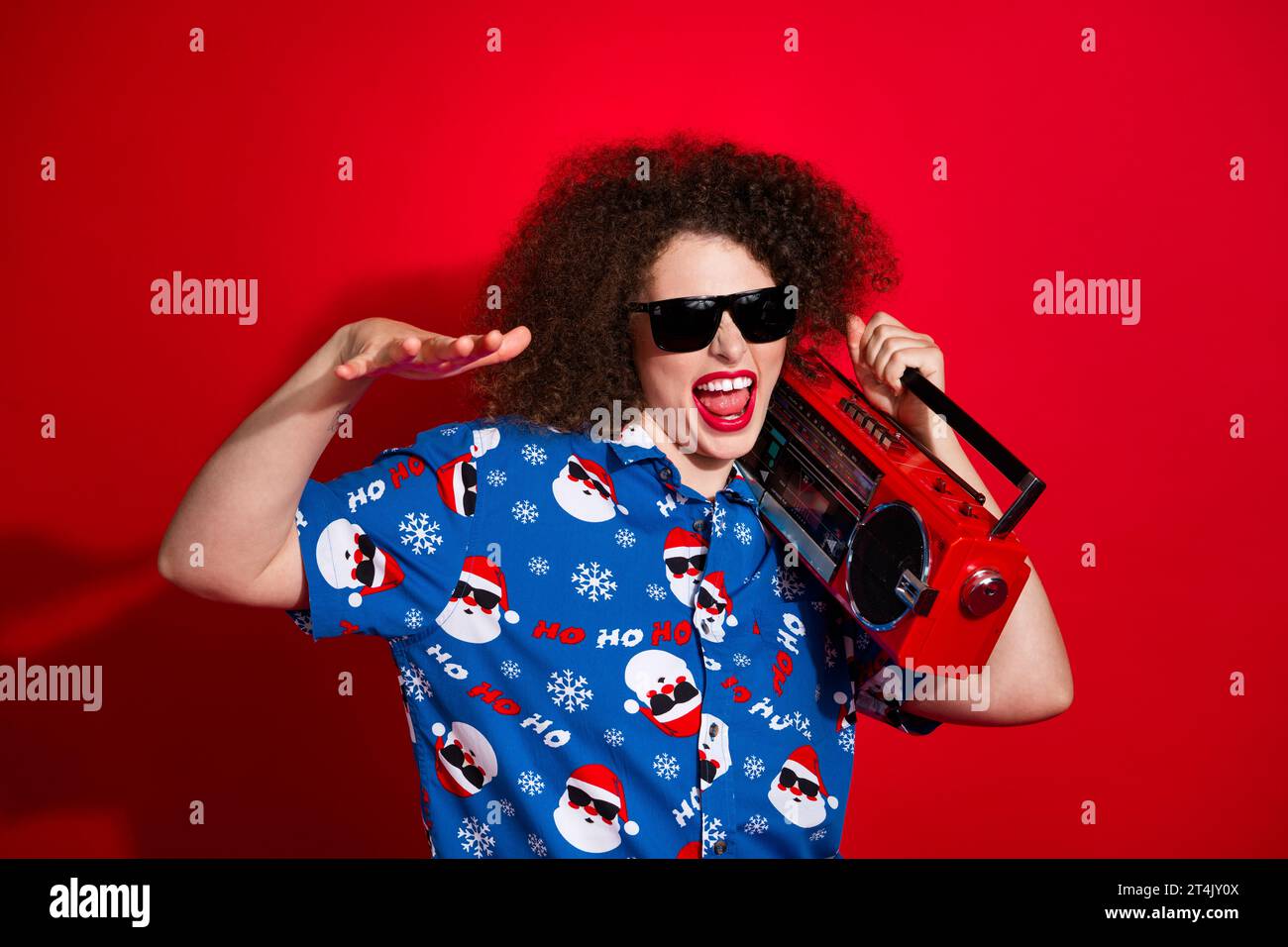 Photo portrait of attractive young woman dance hold tape recorder dressed stylish blue x-mas ...