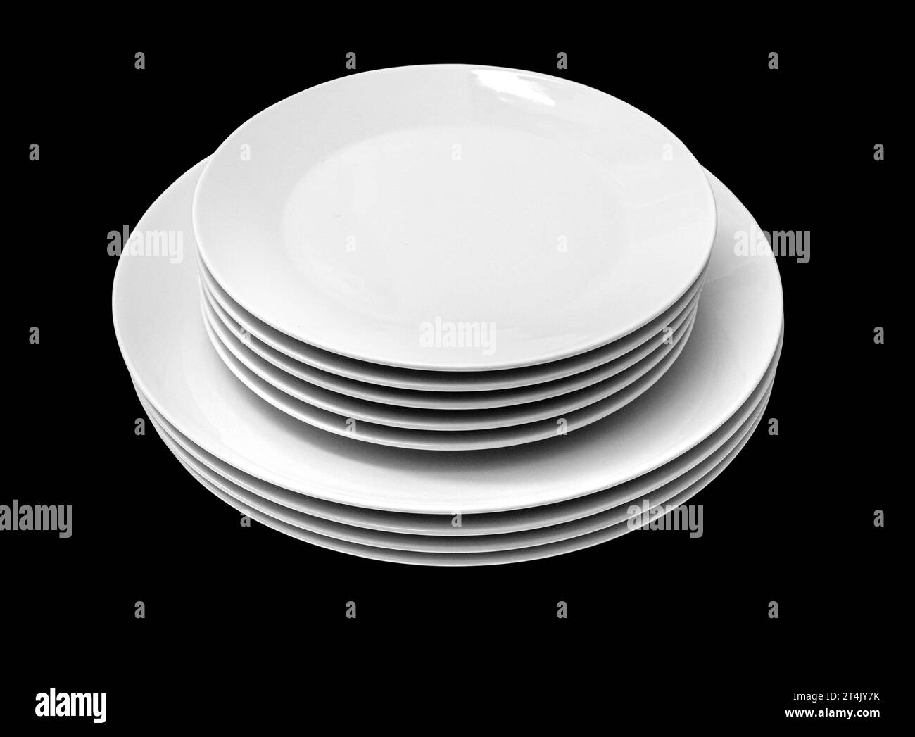 A stack of square white plates isolated on black background Stock Photo ...