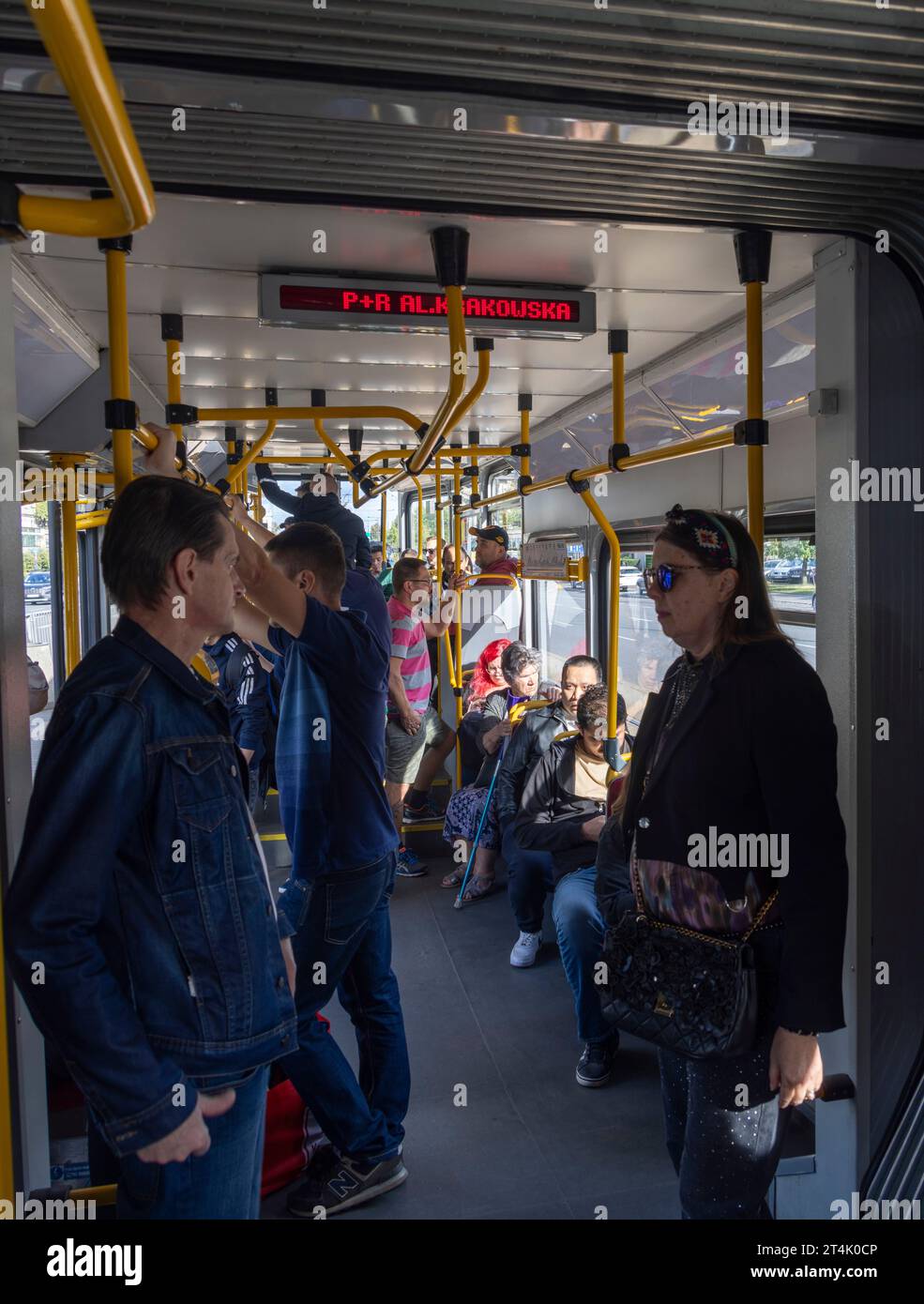 Passengers inside tram in Warsaw city center, Poland Stock Photo - Alamy