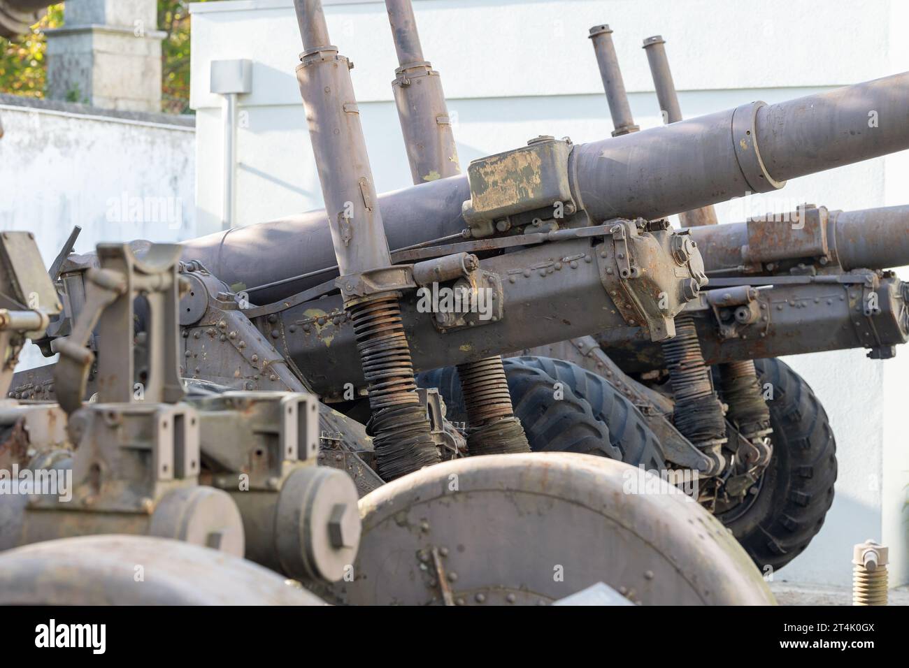 A rustic metallic cannon - old war weapon Stock Photo - Alamy