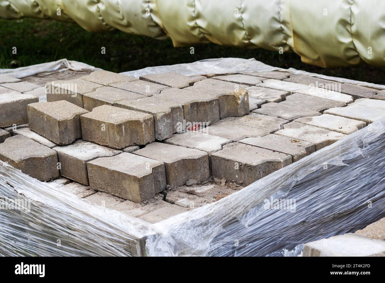 Packaging of paving slabs on the construction site close up Stock Photo ...