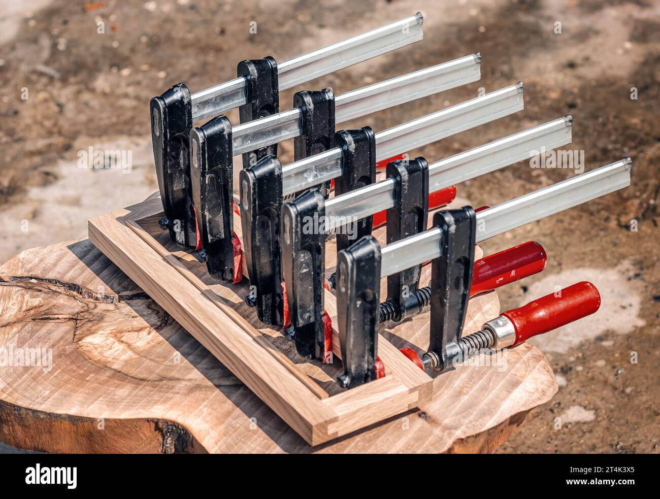 Carpentry clamps glue a wooden frame Stock Photo - Alamy