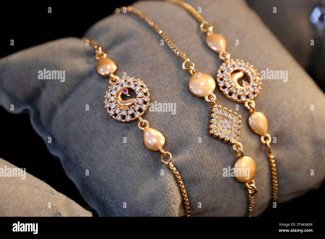 colorful traditional indian jewelry displayed in a street shop for sale ...