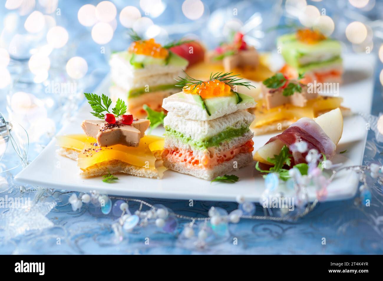 Assortment festive appetizers on the plate Stock Photo - Alamy
