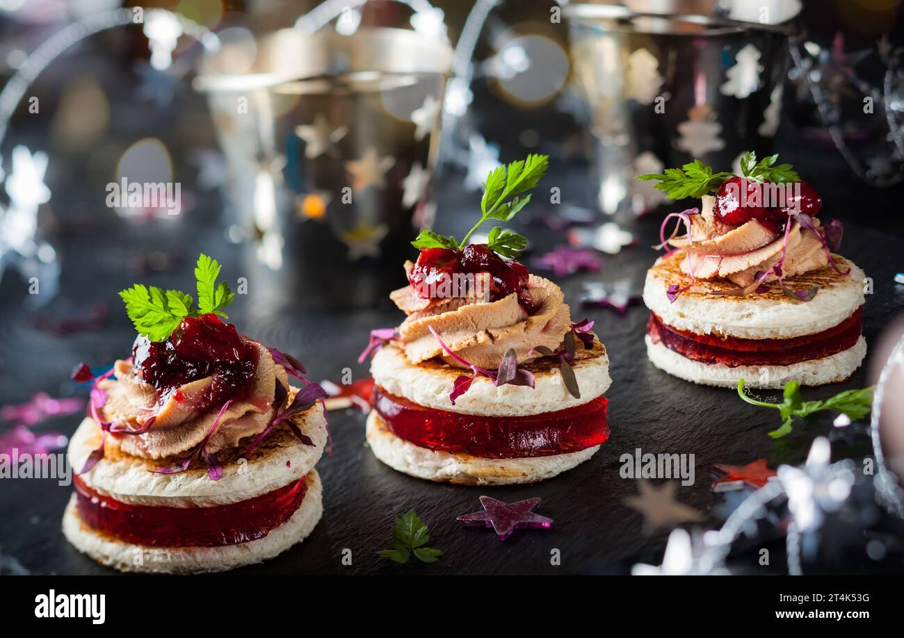 Festive appetizer with foie gras, cranberry chutney and jelly Stock ...