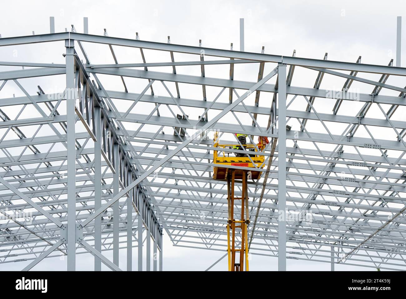 Complex large volume steel frame structure assembly using self ...