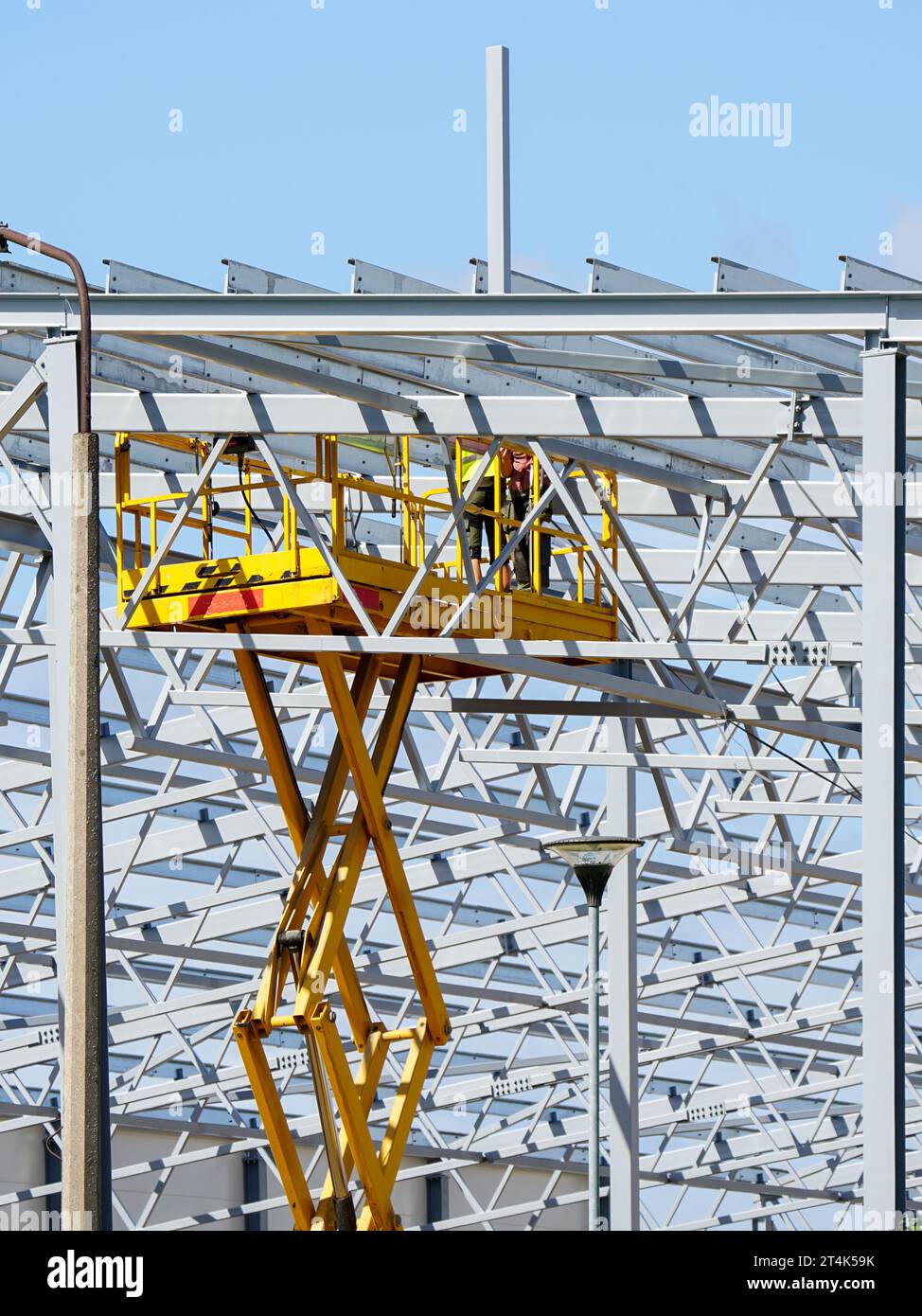 Complex large volume steel frame structure assembly using self ...