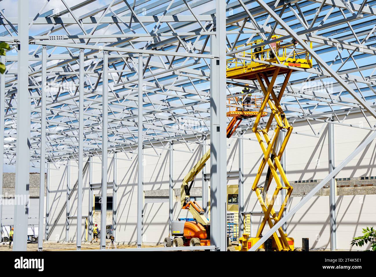 Complex large volume steel frame structure assembly using self ...