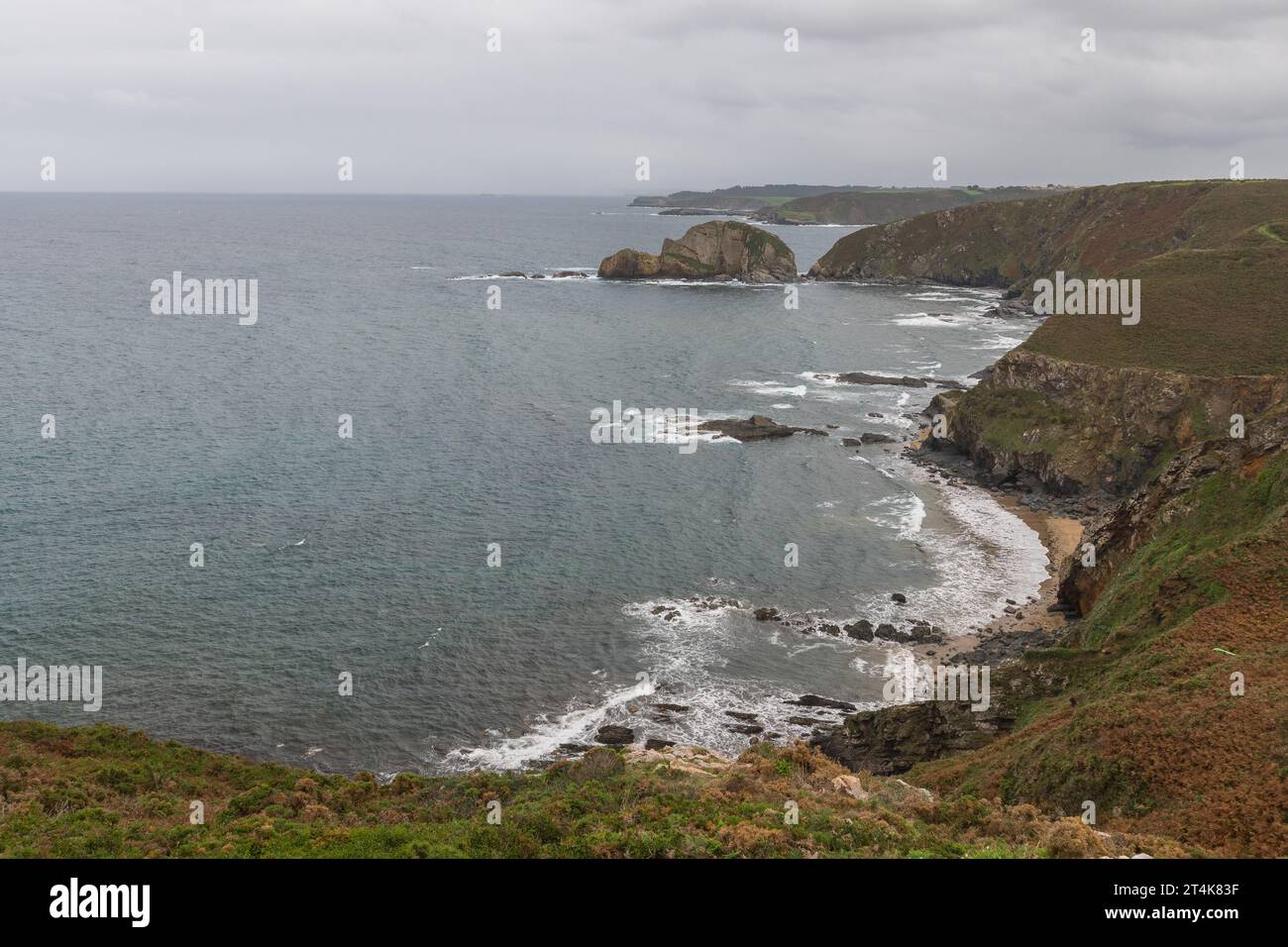 Turtle rock Island view in Asturias coastline Stock Photo - Alamy