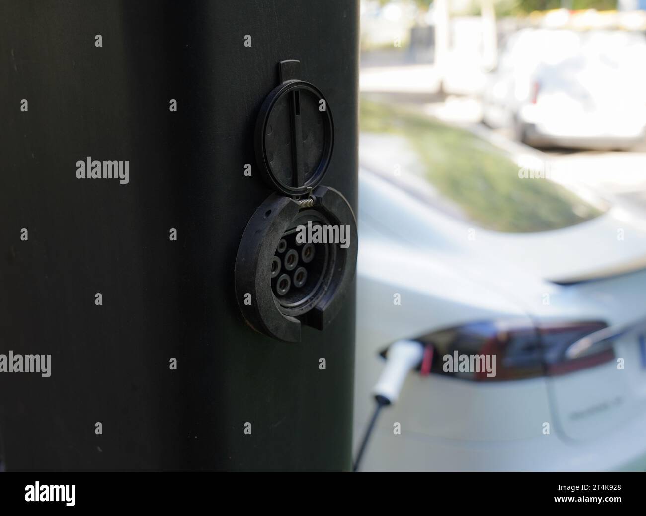 EV charging station for electric cars with green and eco-energy and ...