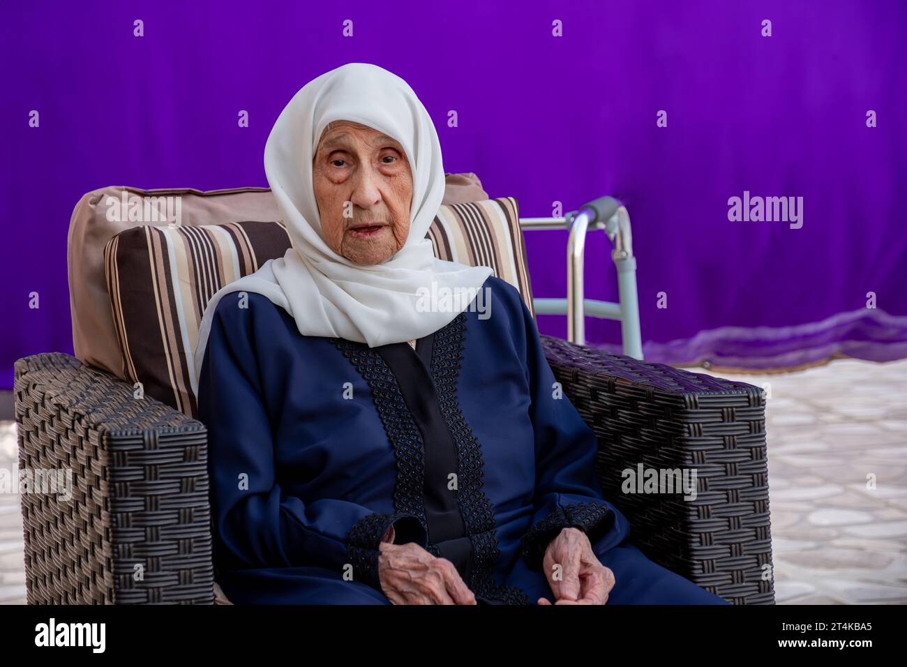 portrait for Old muslim woman using walker Stock Photo - Alamy