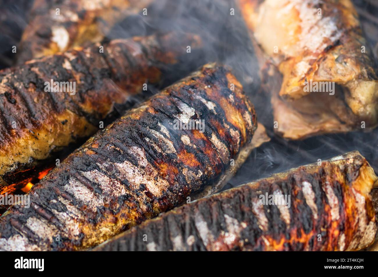 Grilled fish on charcoal grill. Fresh fish barbecue Stock Photo - Alamy